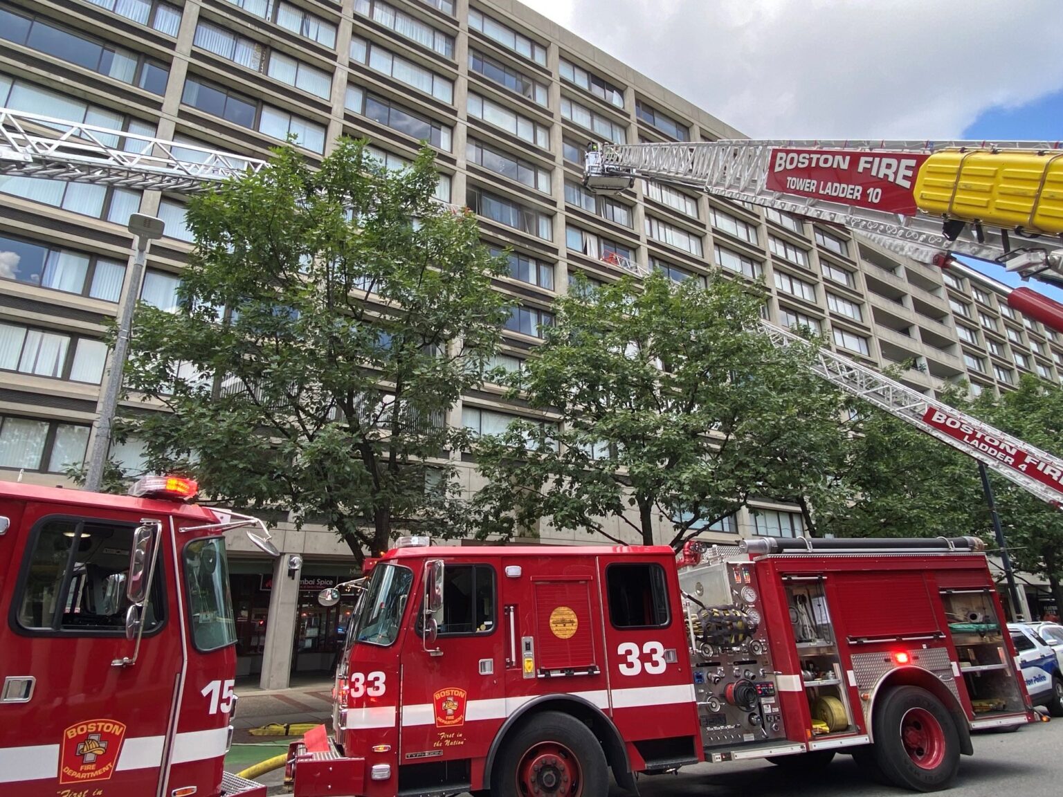 Boston, MA Fire Department responding to a high rise fire in the City